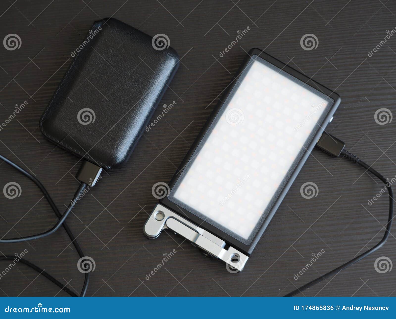 Compact RGB Light Source is Charged by Portable Charging Stock Photo ...