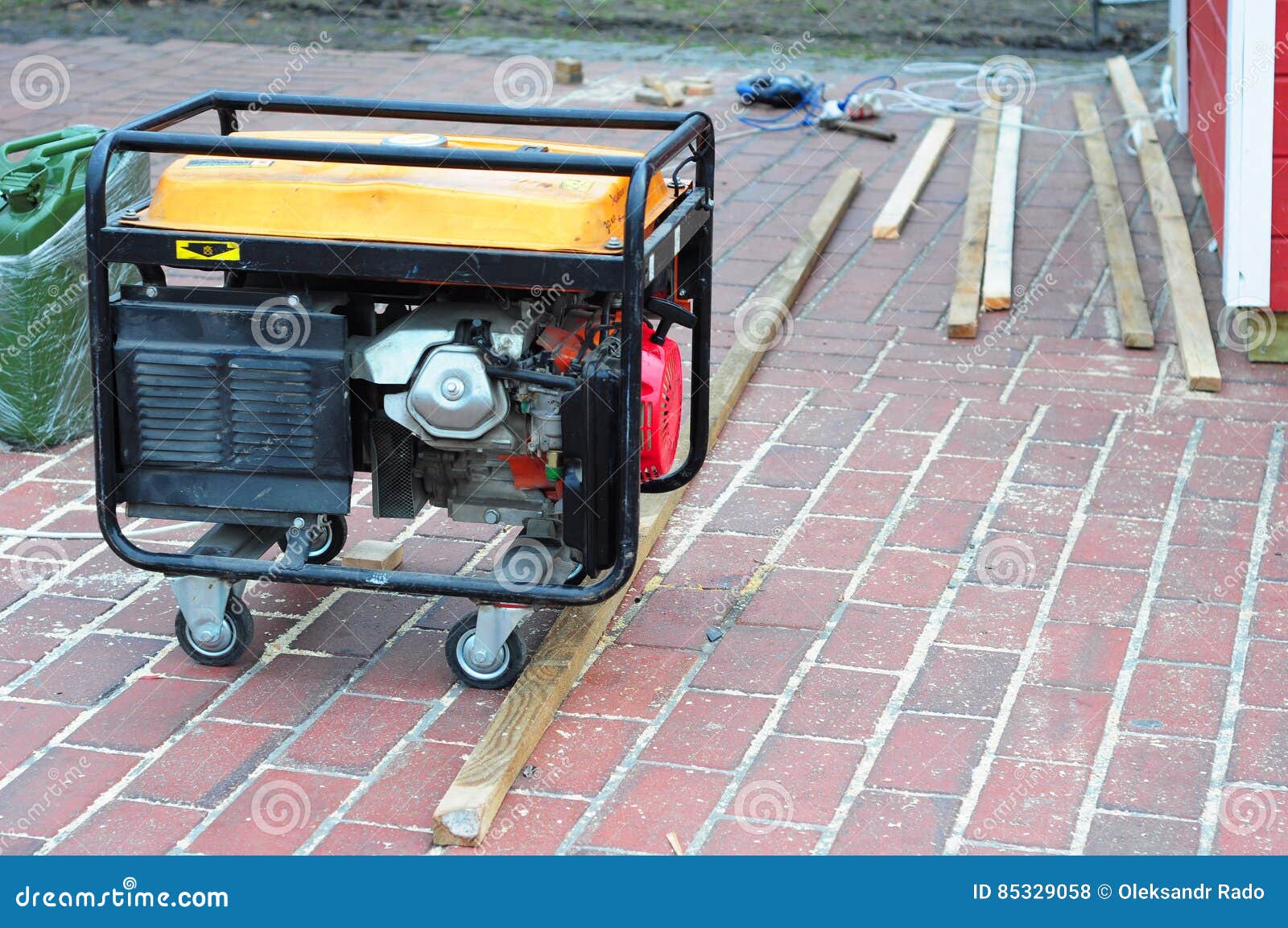 Portable Generator with Wheels on the House Construction Site. Close Up ...