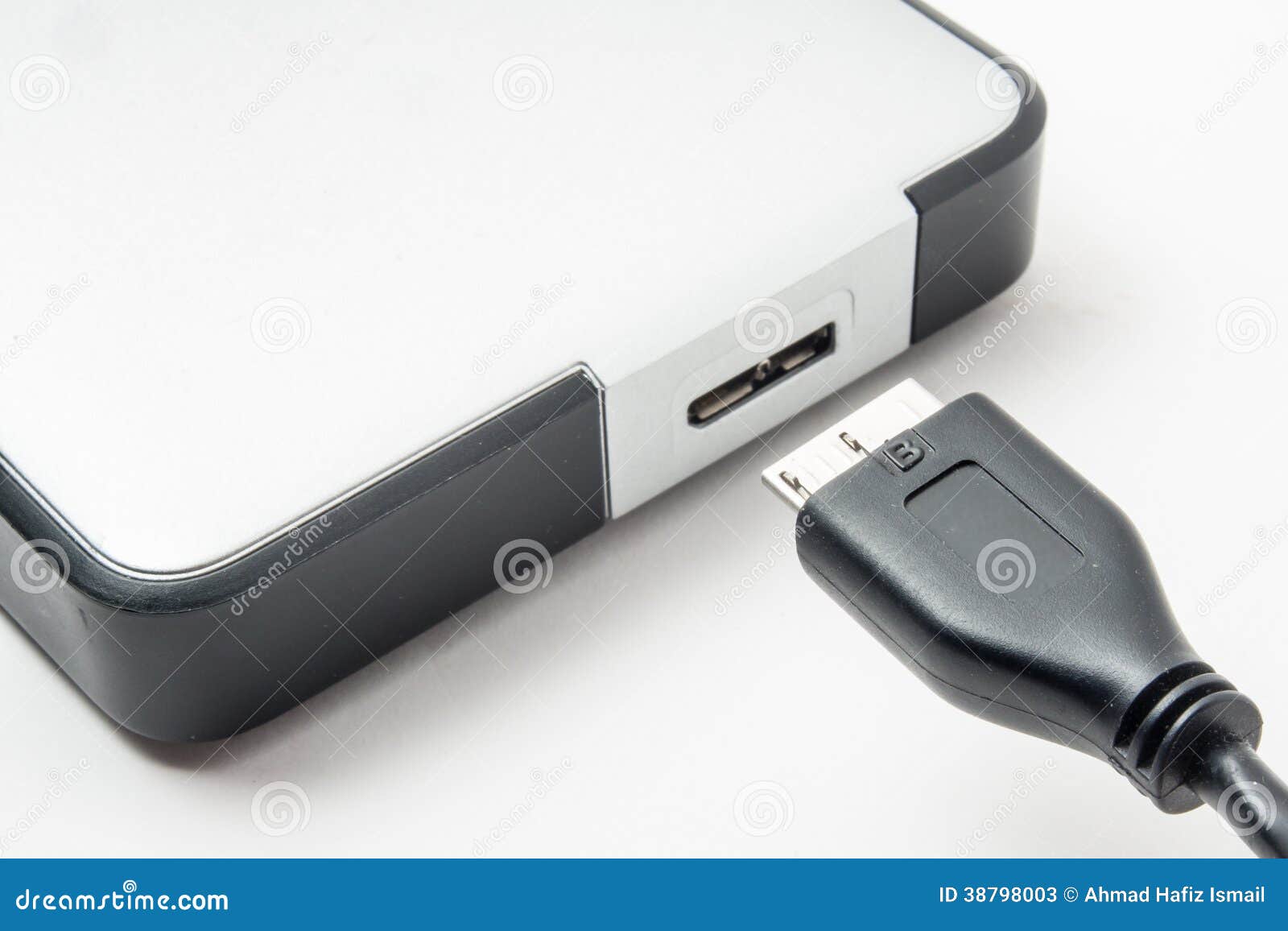Portable Hard Disk with USB 3.0 Connectivity and Wire on a White Stock ...