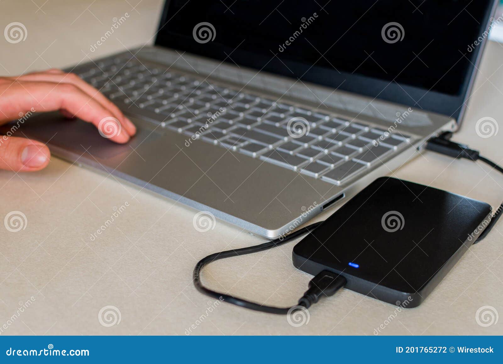 Portable Hard Drive Connected To a Laptop - Concept of Data Storage ...
