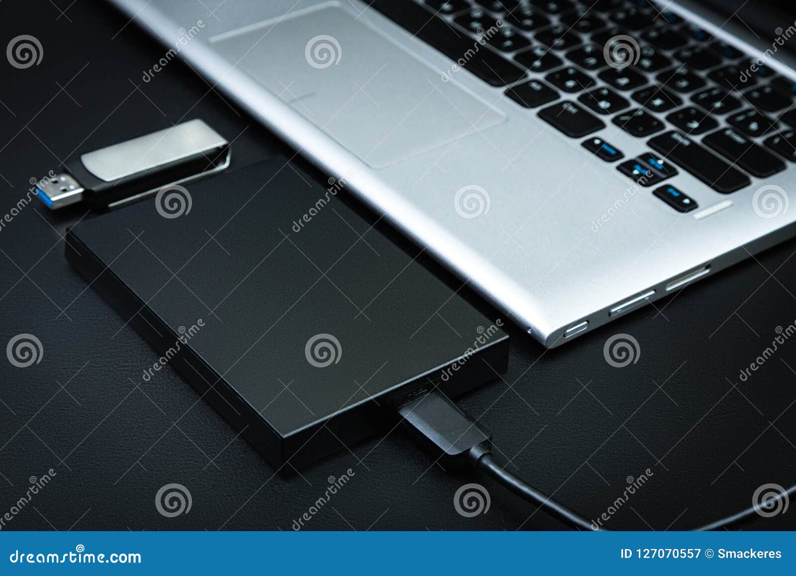 A Portable Hdd Connected To a Laptop with Usb Flash Drive and Sm Stock ...