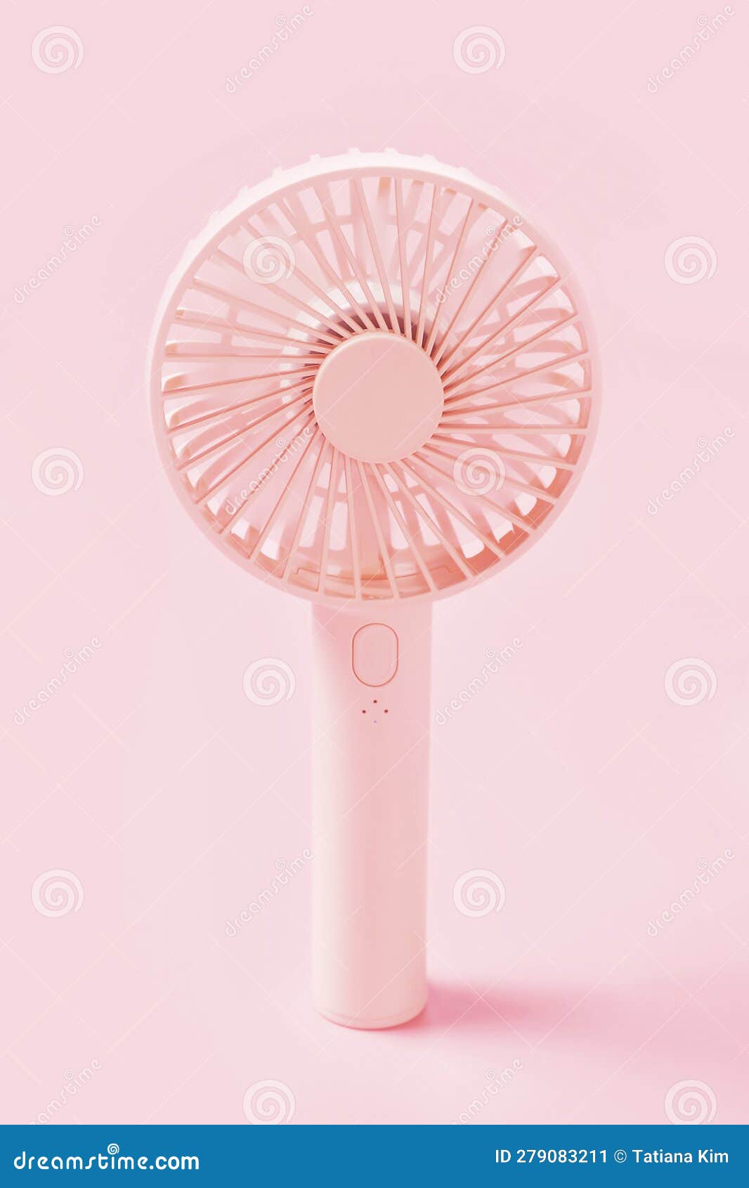Portable Mini Fan on Pink Background Close-up, Front View. Stock Image ...