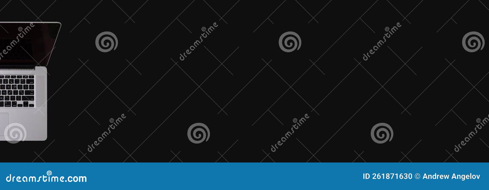 Portable Modern Silver Computer on a Black Background. Half the ...