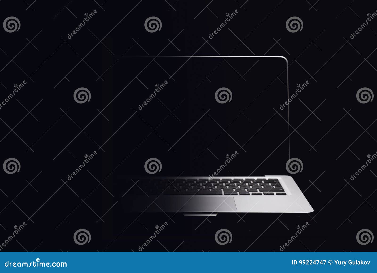 Portable Modern Silver Computer on a Black Background. Editorial ...