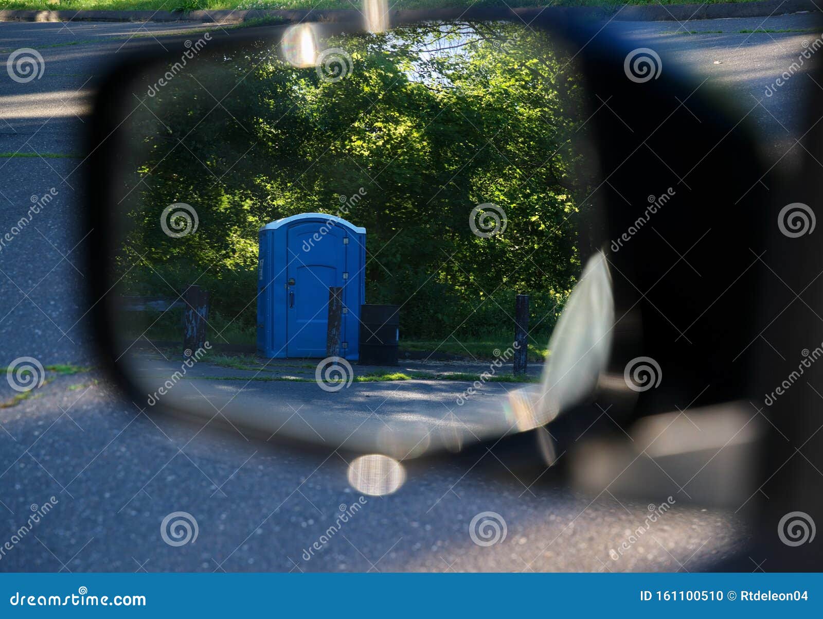 Portable Potty in Car`s Side Mirror Stock Photo - Image of hunting ...