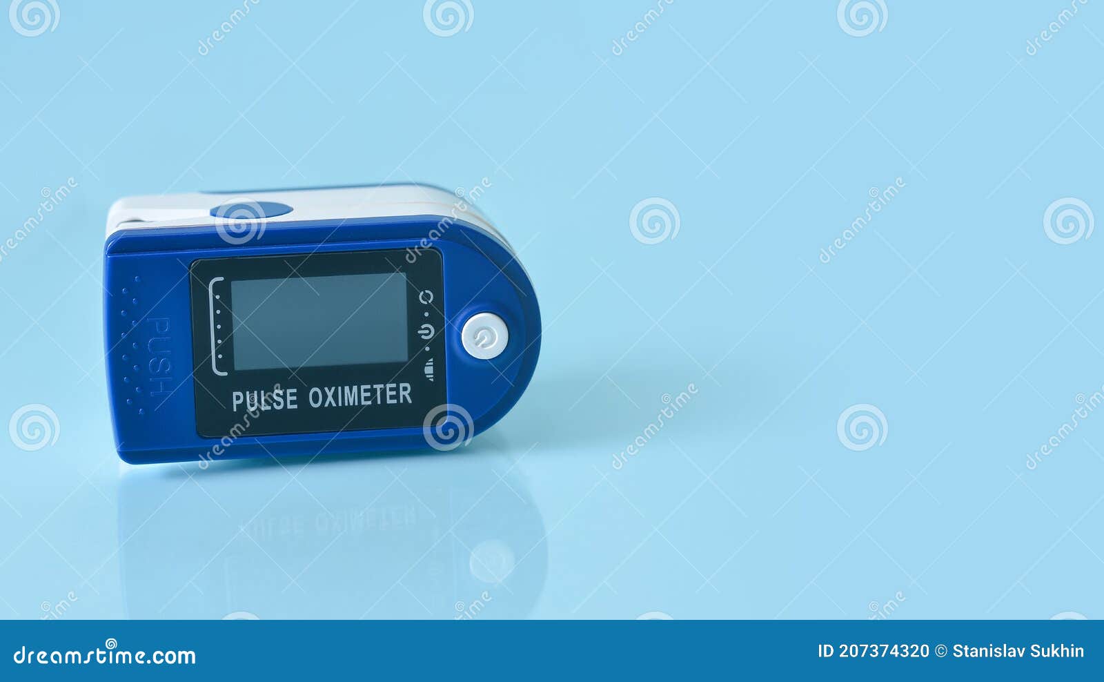 Portable Pulse Oximeter Isolated on Blue Background.Copy Space for Text ...