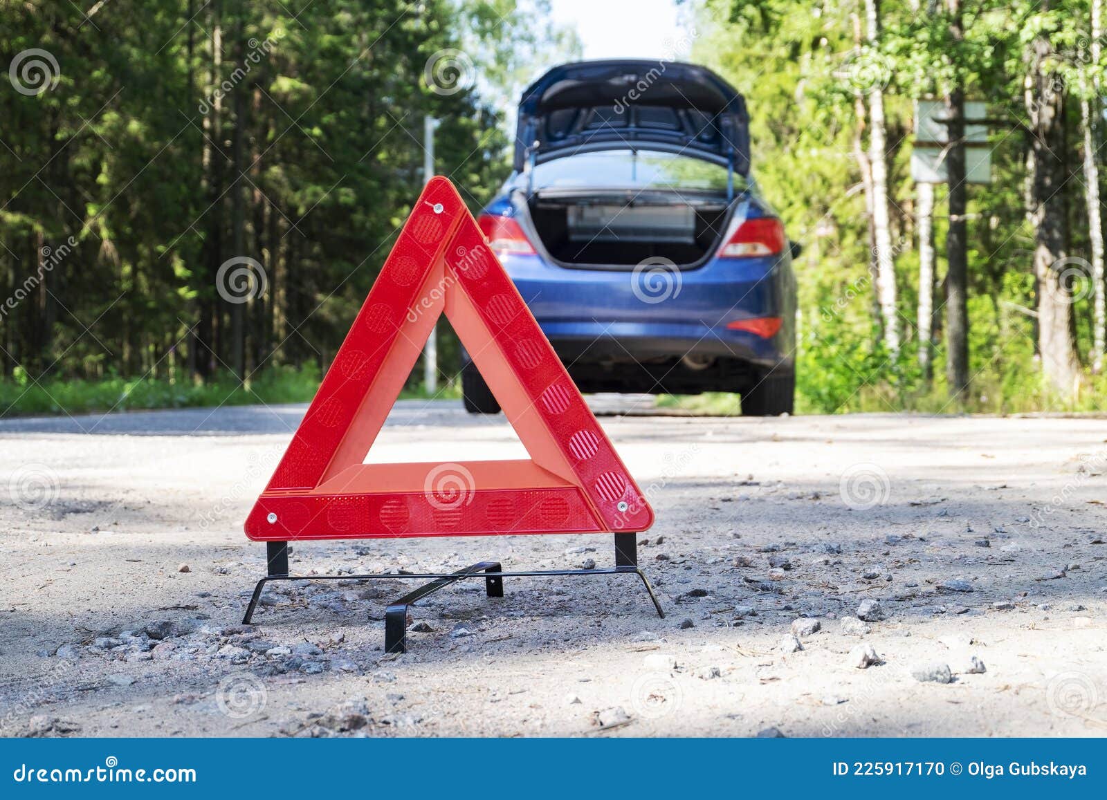 Portable Reflective Red Warning Triangular Sign on the Side Stock Photo ...