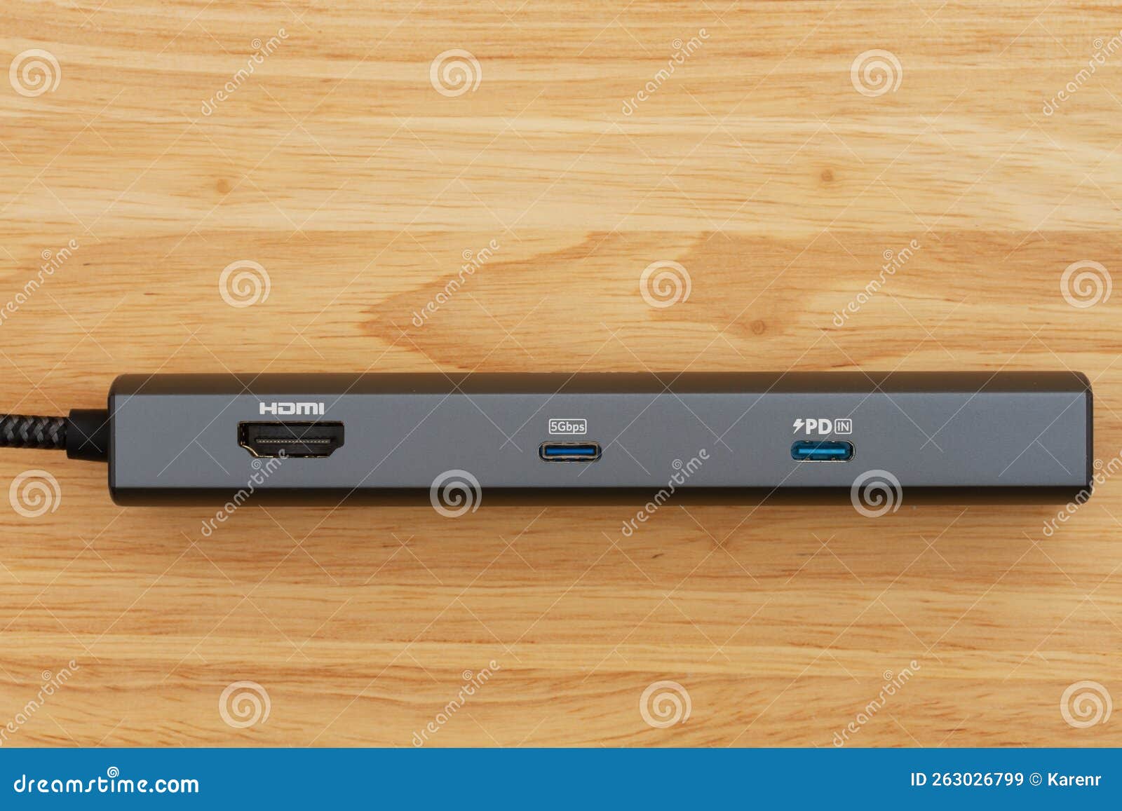 Portable USB-C Hub for Connecting USB Devices on Wood Desk Stock Image ...