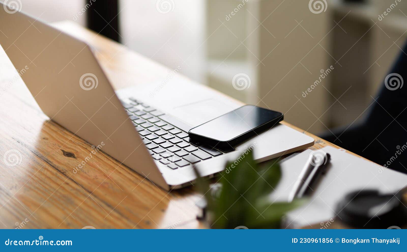 Portable Workplace with Laptop Computer and Mobile Phone Stock Photo ...