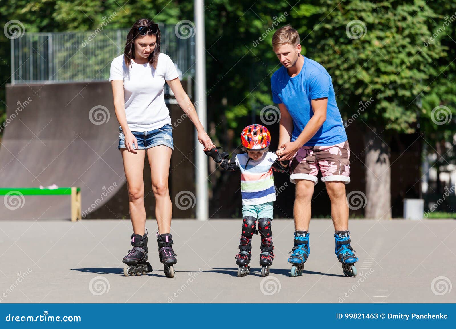 Cute Baby Boy and His Mom Learning Inline Skating Stock Image - Image ...