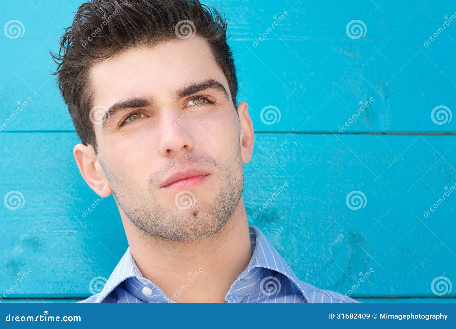 Portait of a Handsome Young Man with Serious Expression Stock Image ...