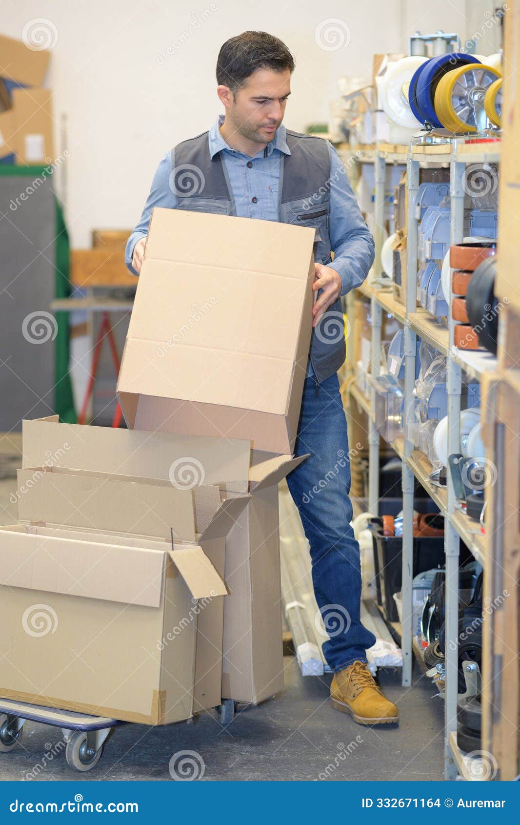 Porter Carrying Boxes in Warehouse Stock Photo - Image of worker ...