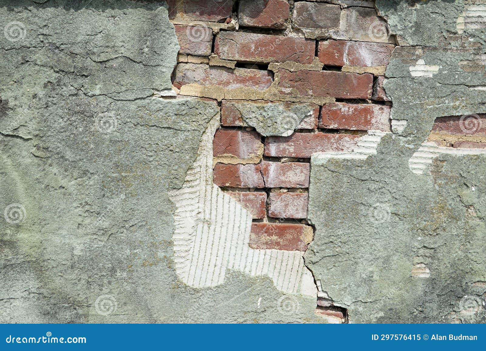 A Portion of a Broken Plaster Wall with with Underlying Exposed Red ...