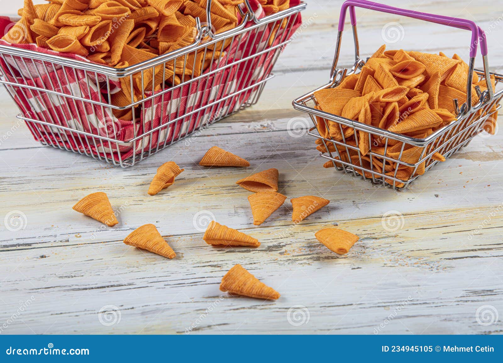 Portion Of Cone Shaped Snack Tornado Shaped Crackers. Yellow Spicy ...