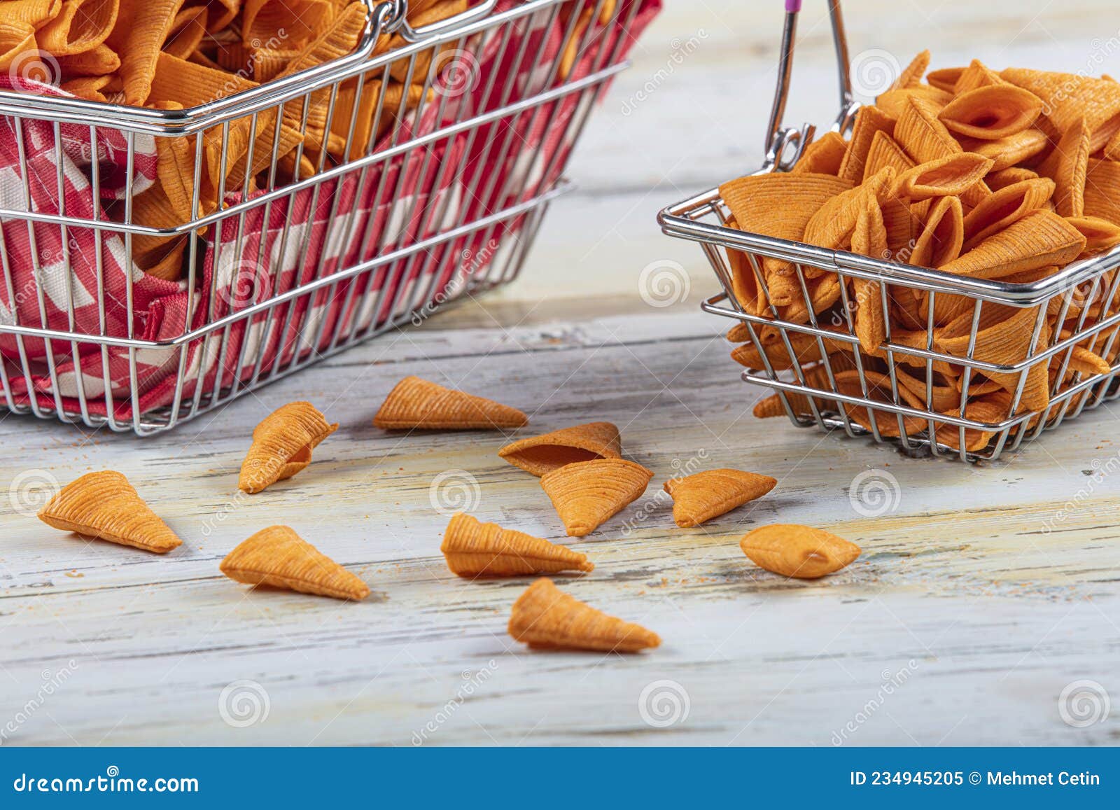 Portion of Cone Shaped Snack Tornado Shaped Crackers. Yellow Spicy ...