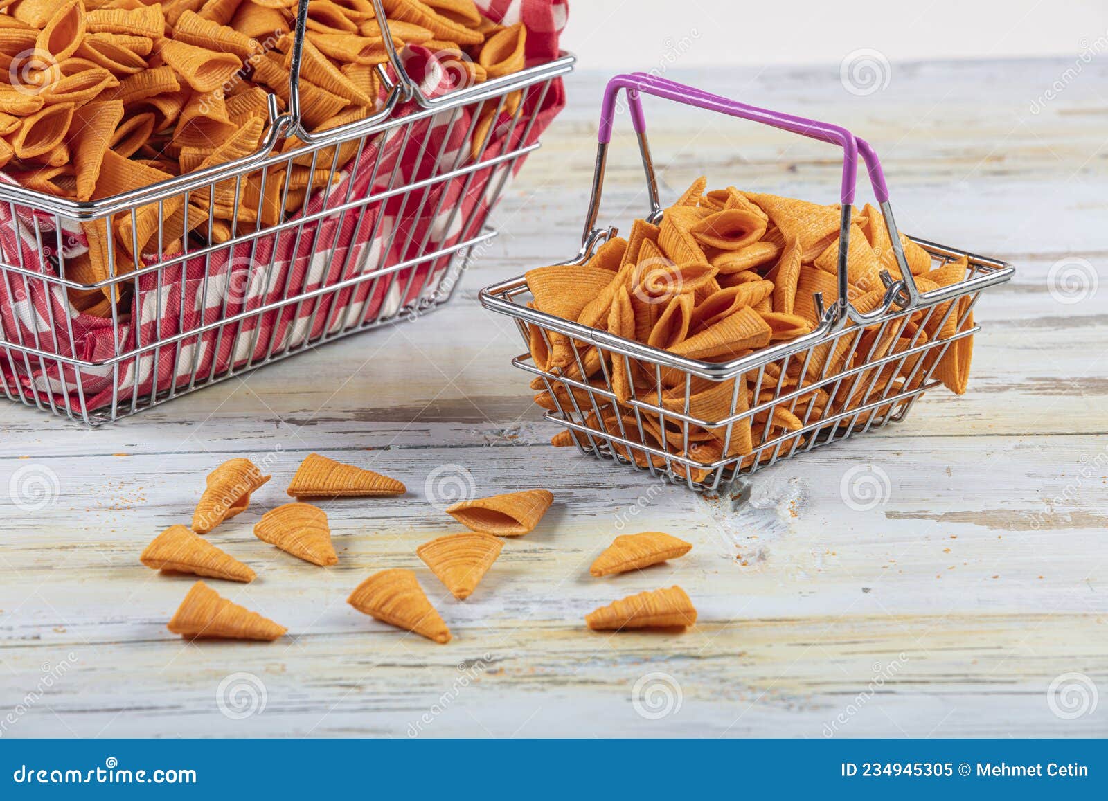 Portion of Cone Shaped Snack Tornado Shaped Crackers. Yellow Spicy ...