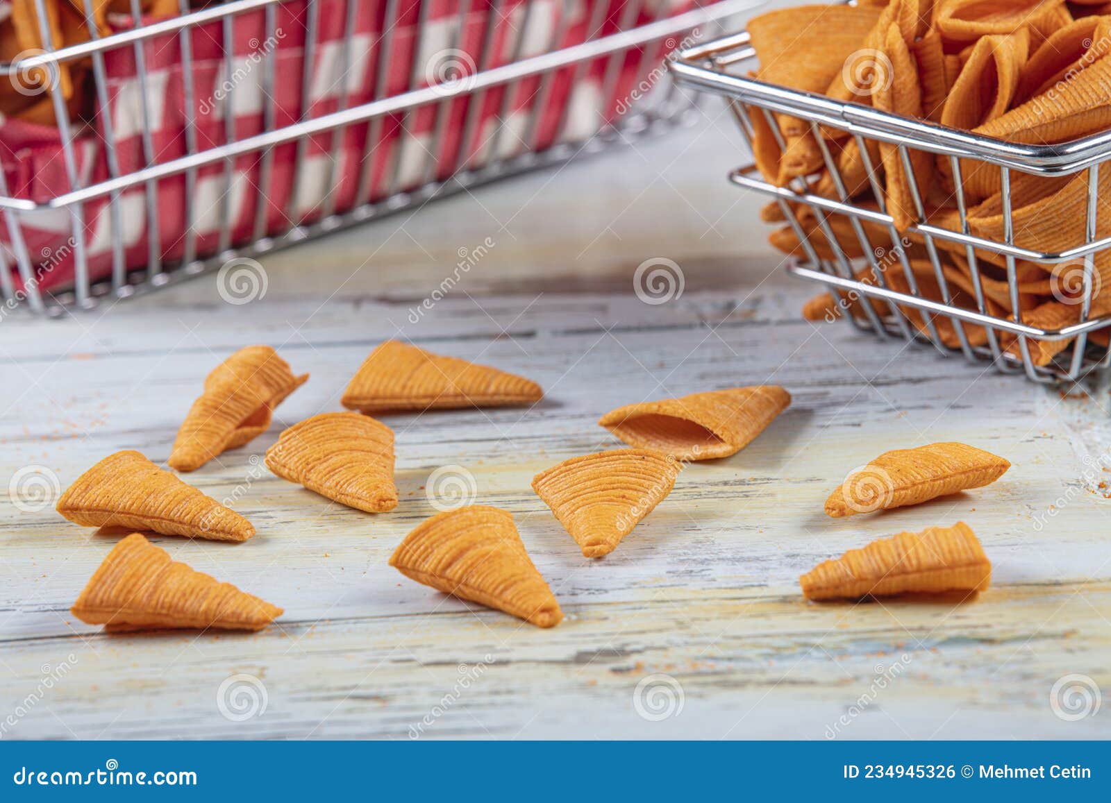 Portion Of Cone Shaped Snack Tornado Shaped Crackers. Yellow Spicy ...