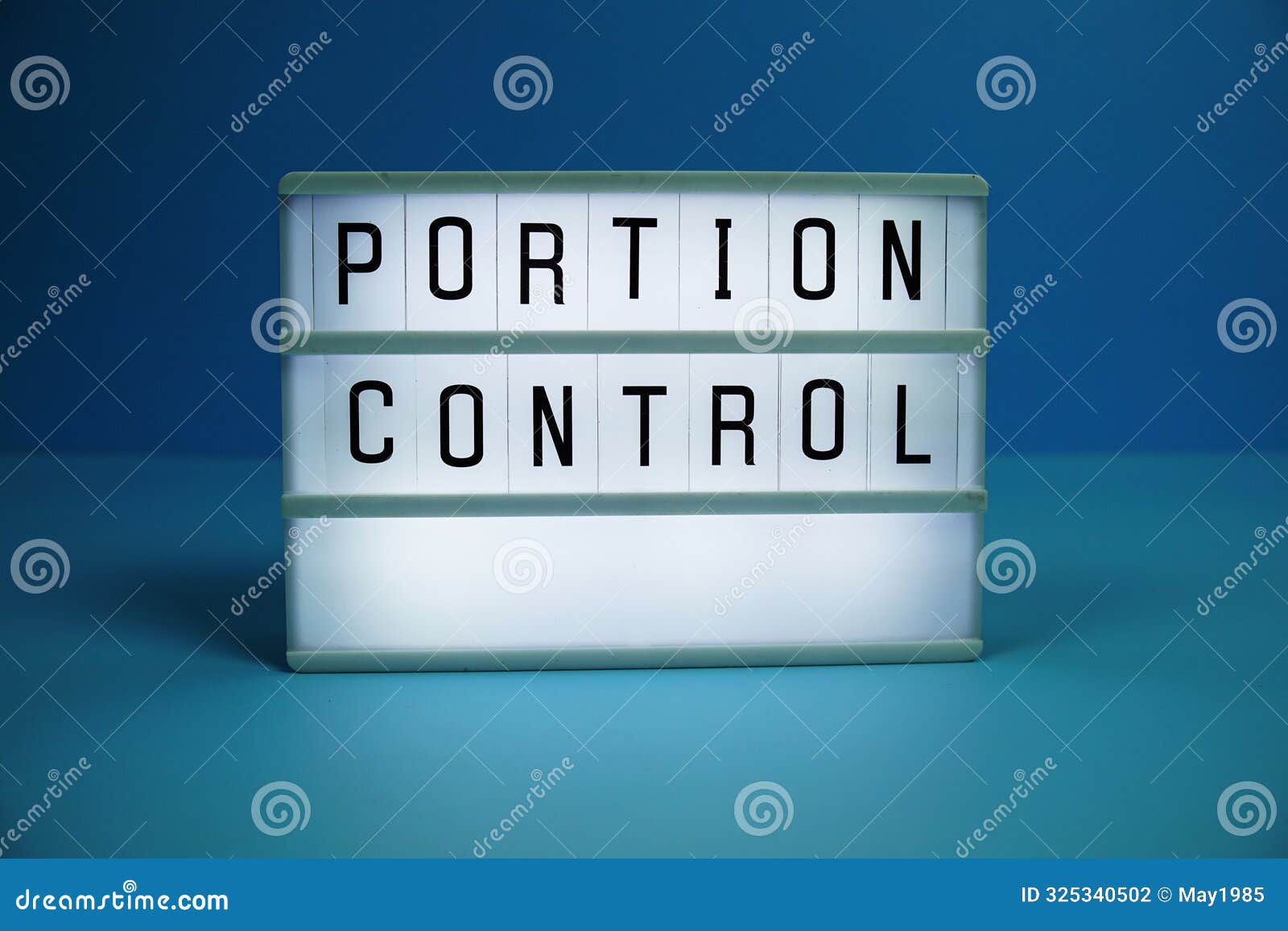 Portion Control Letterboard Text on LED Lightbox on Blue Background ...