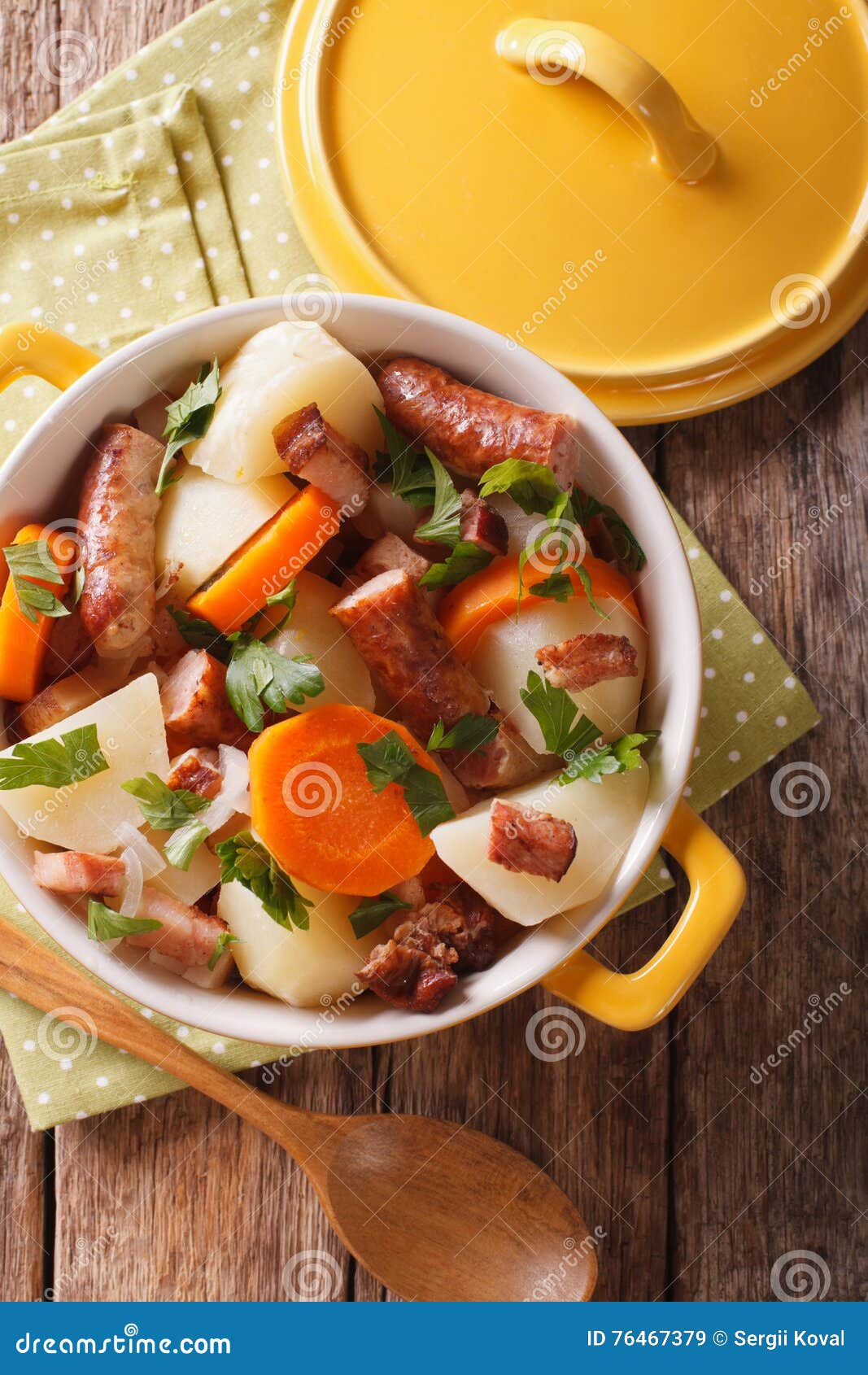 Portion of the Dublin Coddle Close-up in a Yellow Pot. Vertical Stock ...