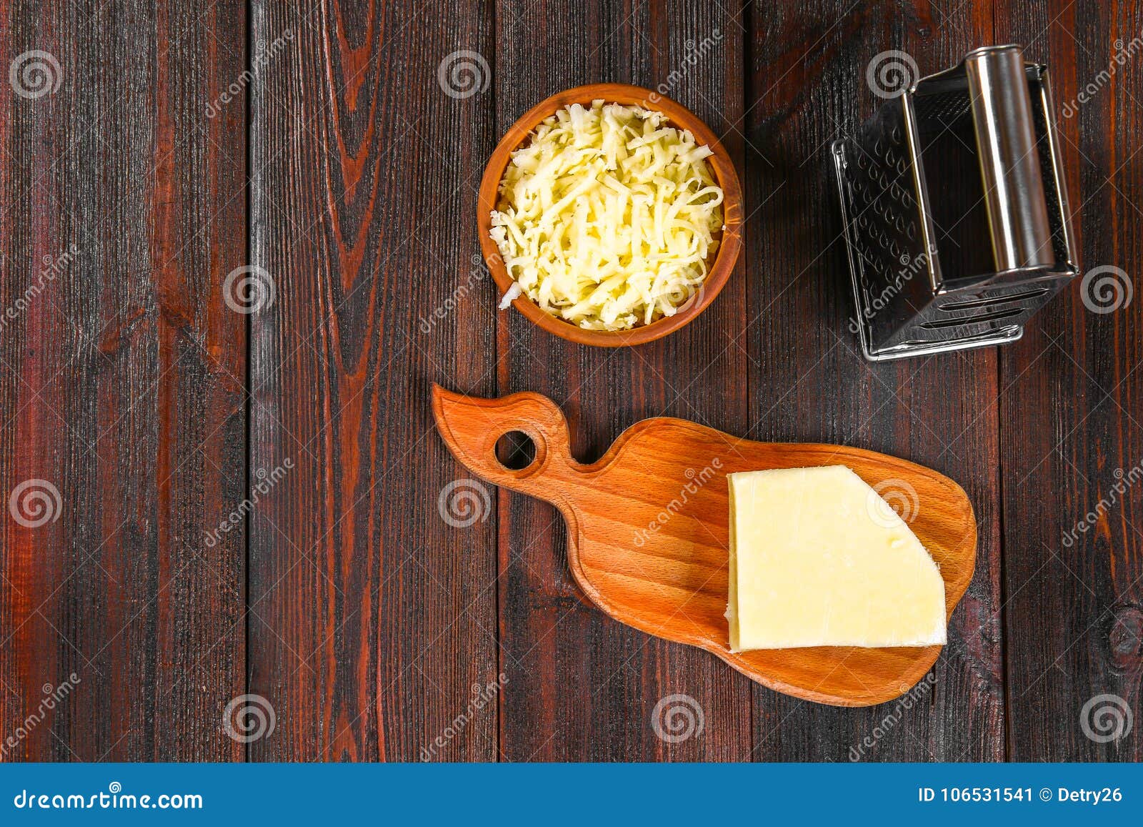 Portion of Grated Cheddar Cheese on Rustic Wooden Table. Stock Image ...