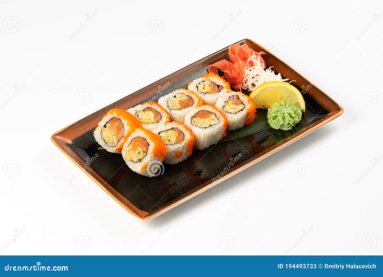 A Portion of Maki Sushi with an Assortment of Japanese Side Dishes in a ...