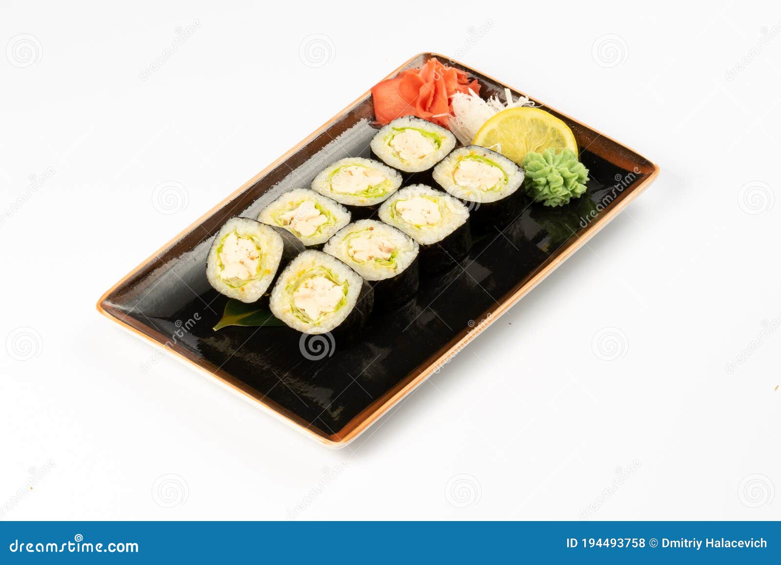 A Portion of Maki Sushi with an Assortment of Japanese Side Dishes in a ...