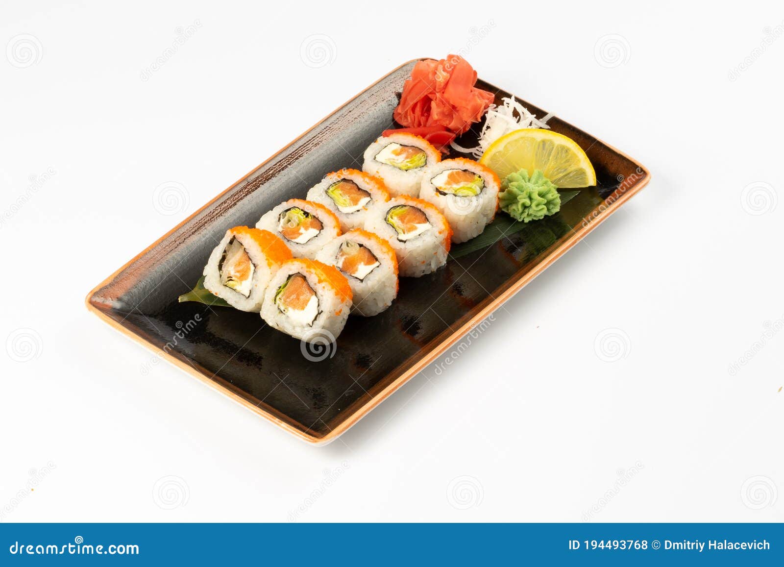 A Portion of Maki Sushi with an Assortment of Japanese Side Dishes in a ...