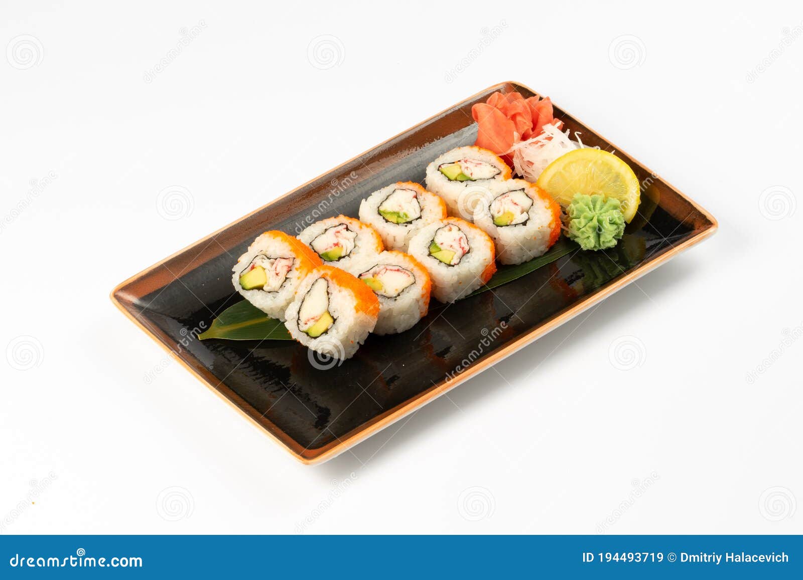 A Portion of Maki Sushi with an Assortment of Japanese Side Dishes in a ...