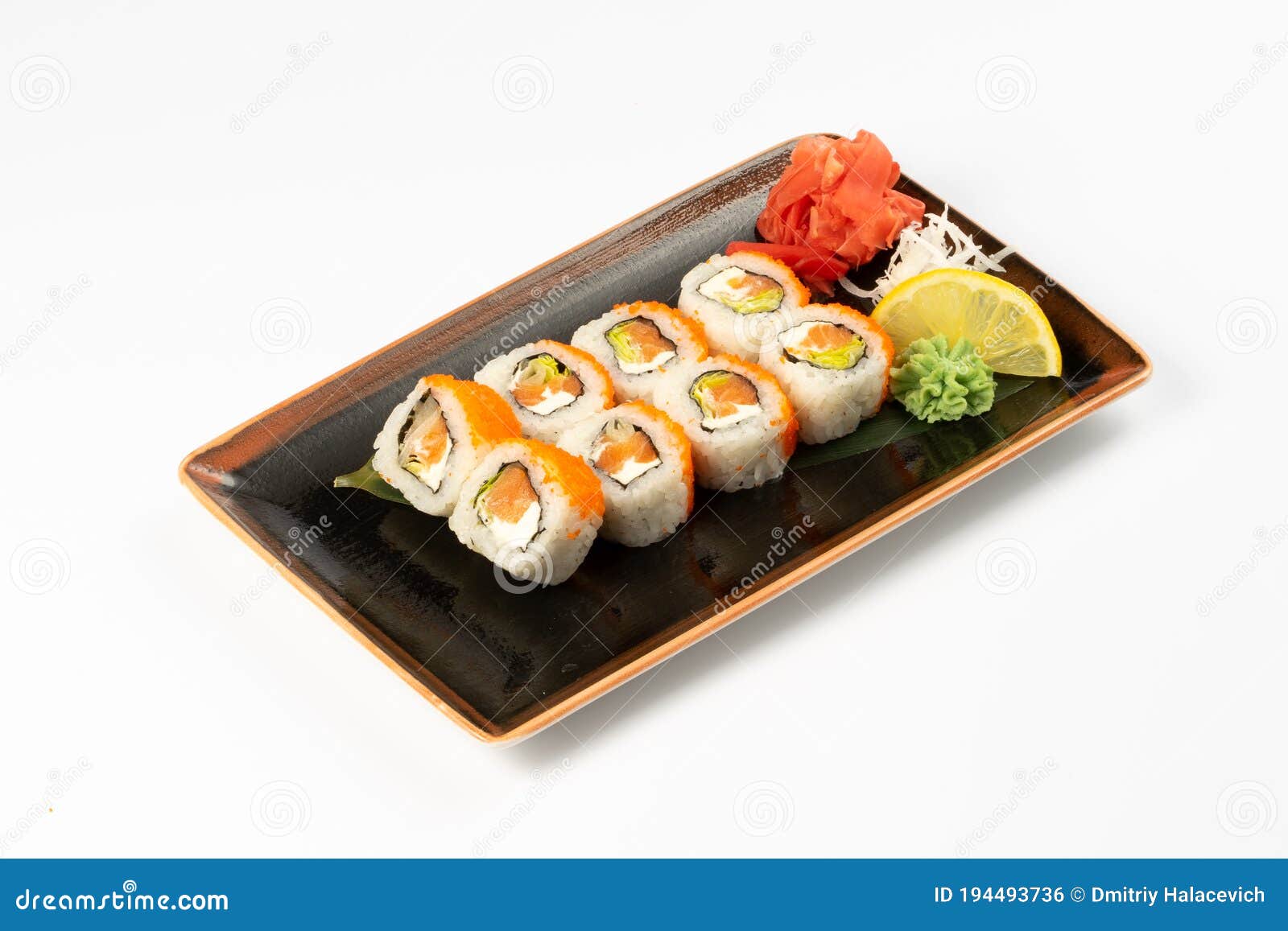 A Portion of Maki Sushi with an Assortment of Japanese Side Dishes in a ...
