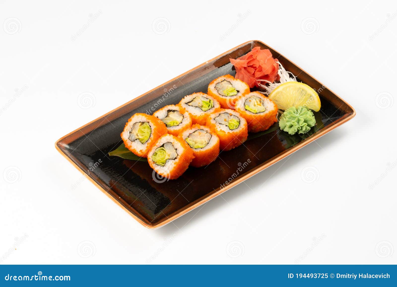 A Portion of Maki Sushi with an Assortment of Japanese Side Dishes in a ...