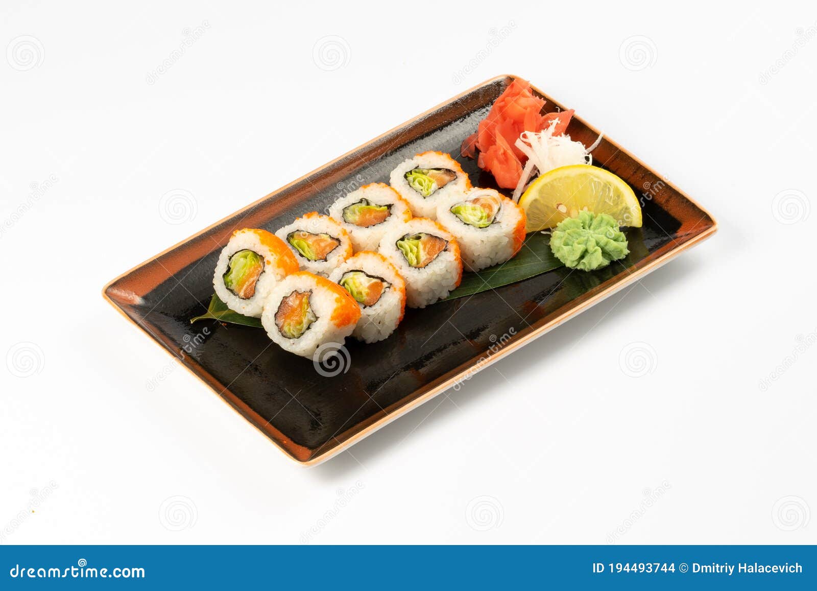 A Portion of Maki Sushi with an Assortment of Japanese Side Dishes in a ...
