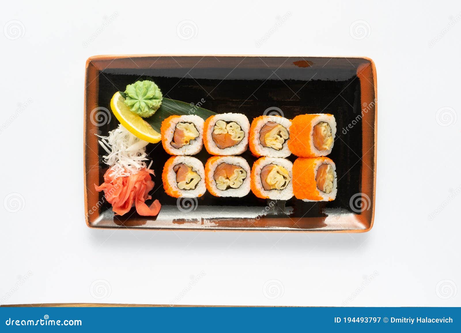 A Portion of Maki Sushi with an Assortment of Japanese Side Dishes in a ...