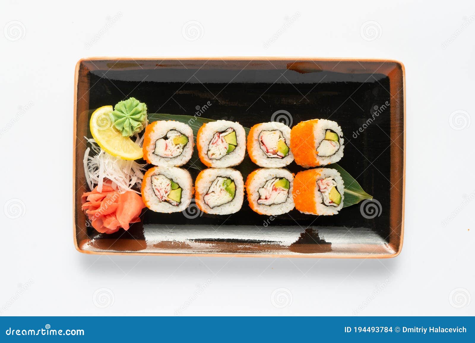 A Portion of Maki Sushi with an Assortment of Japanese Side Dishes in a ...