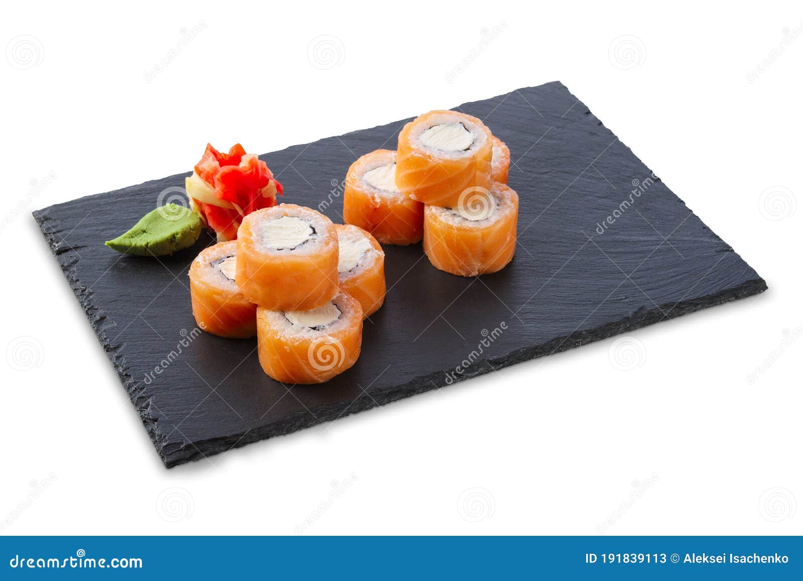 A Portion Of Maki Sushi With An Assortment Of Japanese Side Dishes In A ...