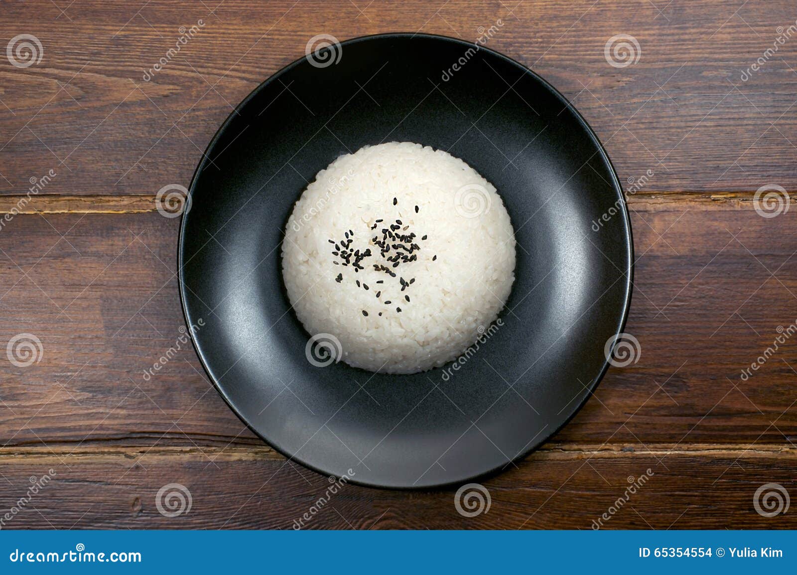 Portion of Rice on the Plate Top View with Sesame Seeds Stock Photo ...