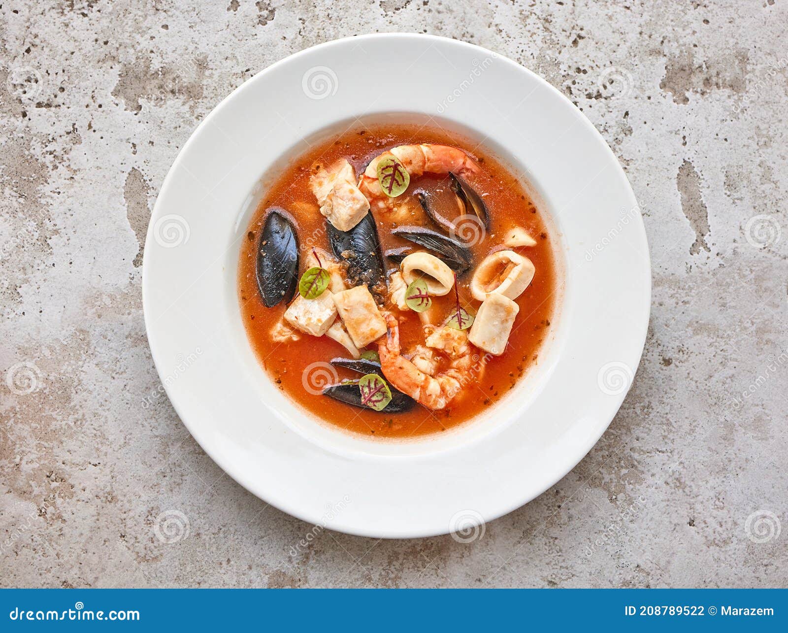Portion of seafood soup stock photo. Image of portion - 208789522