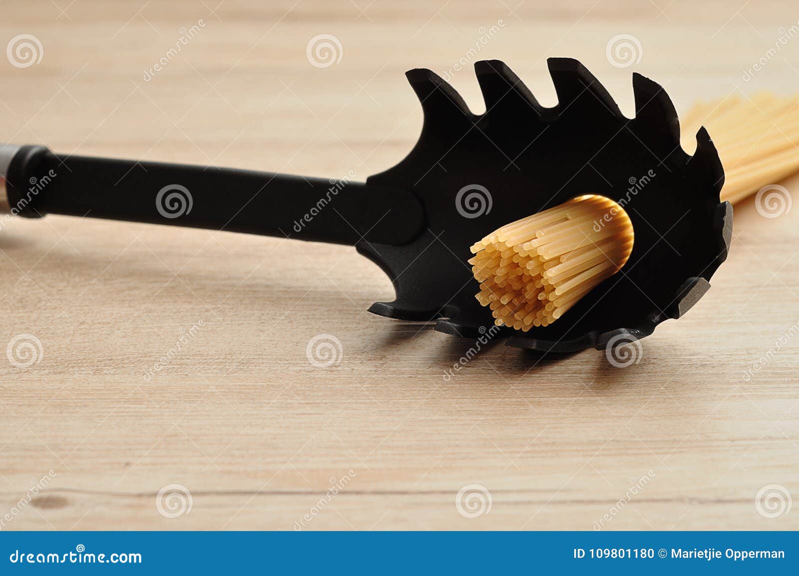 A Portion of Spaghetti Measured in a Spoon Stock Photo - Image of long ...