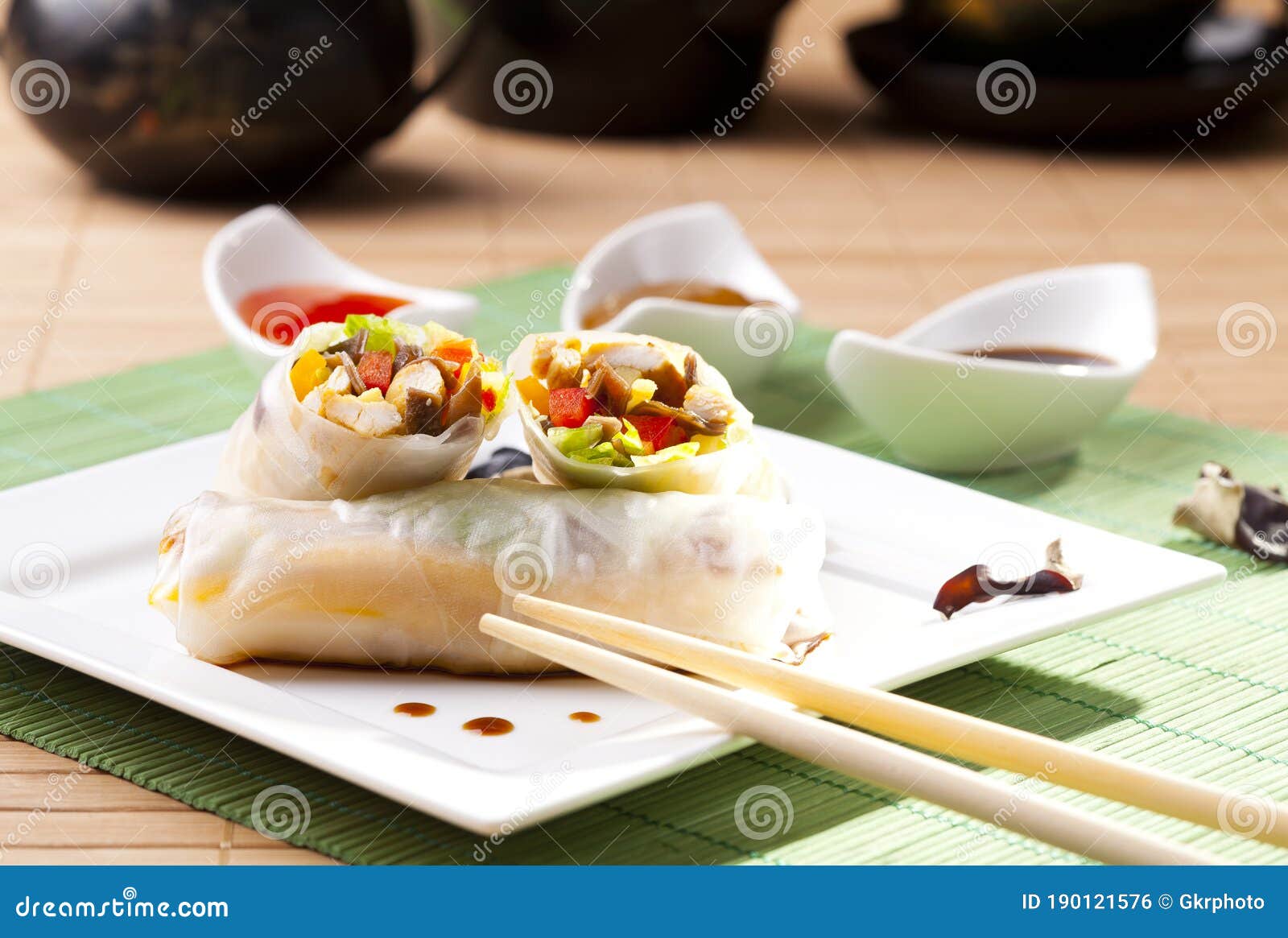 Portion of Spring Rolls on Plate Stock Photo - Image of dinner, rice ...