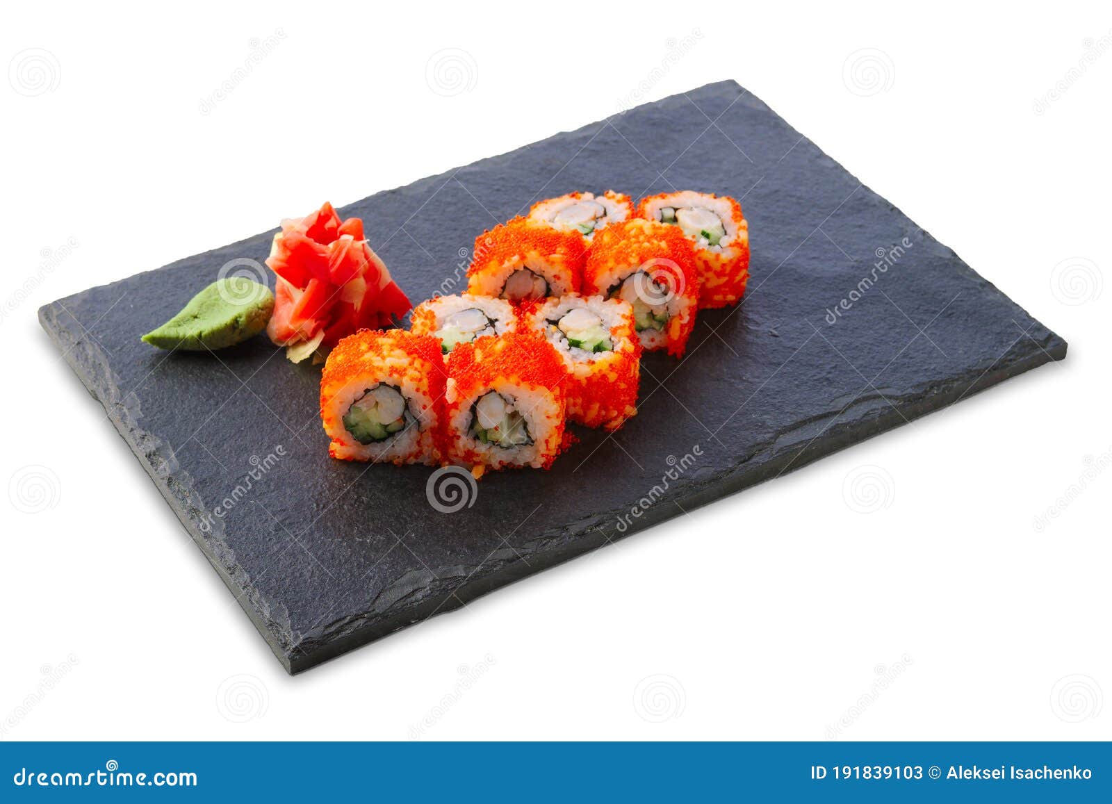 A Portion Of Maki Sushi With An Assortment Of Japanese Side Dishes In A ...
