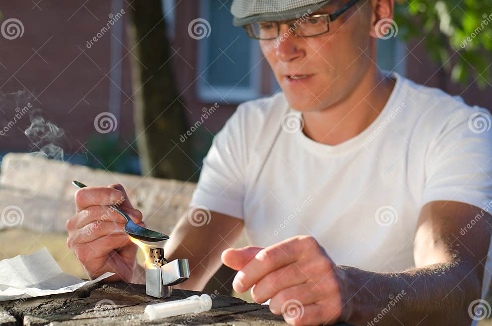 Portrait of an Addicted Man Disolving Heroin Stock Photo - Image of ...