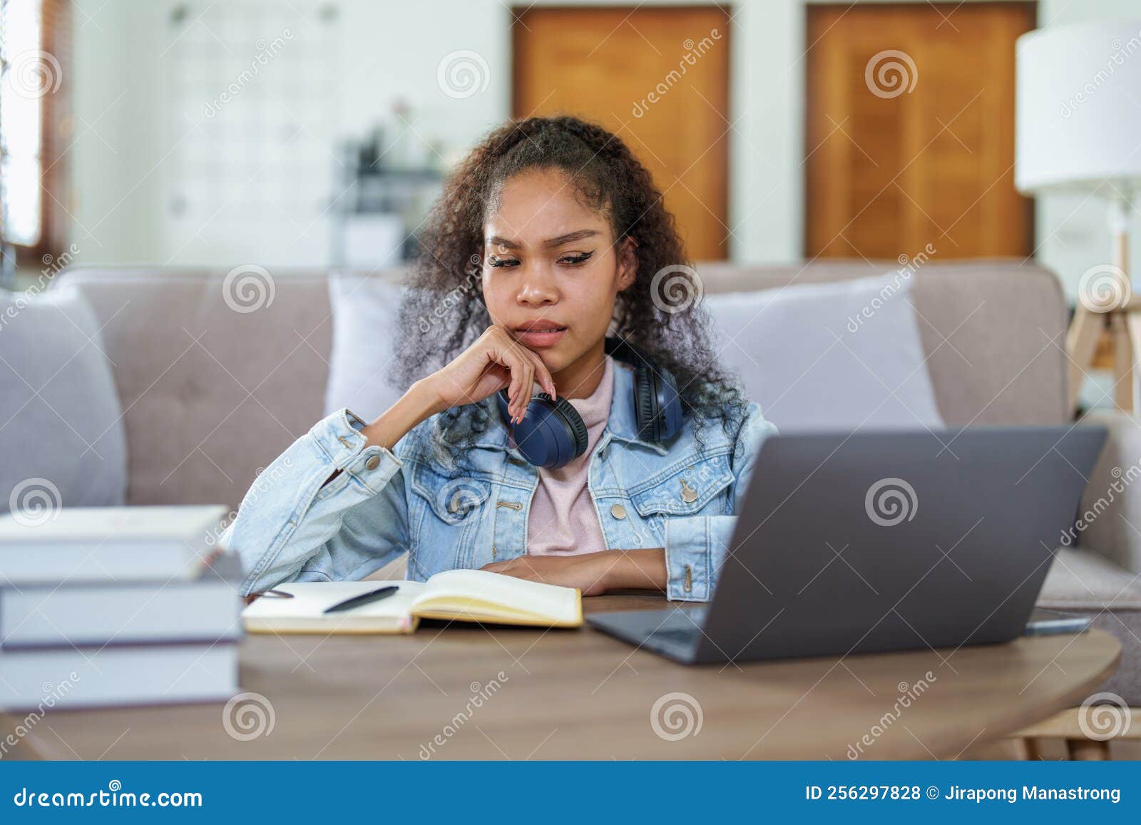 African American Using Computers and Notebooks Online Stock Photo ...