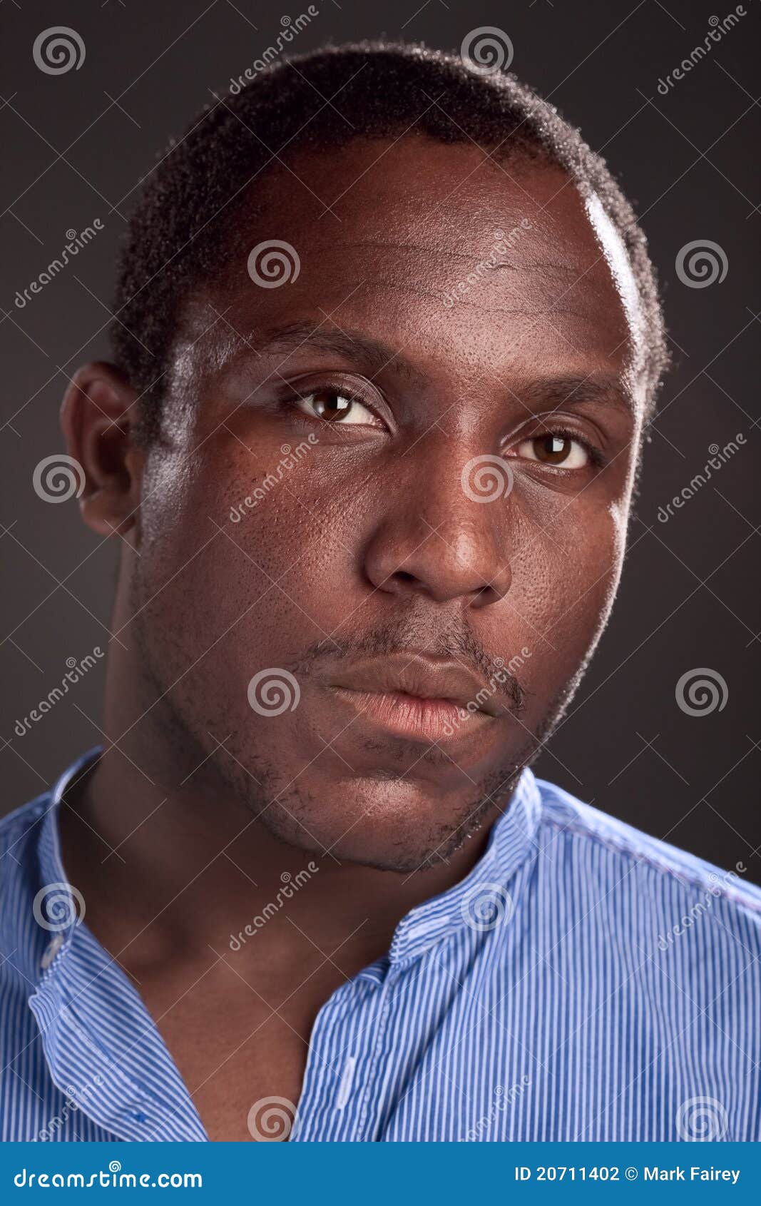 Portrait of an African man stock photo. Image of looking - 20711402