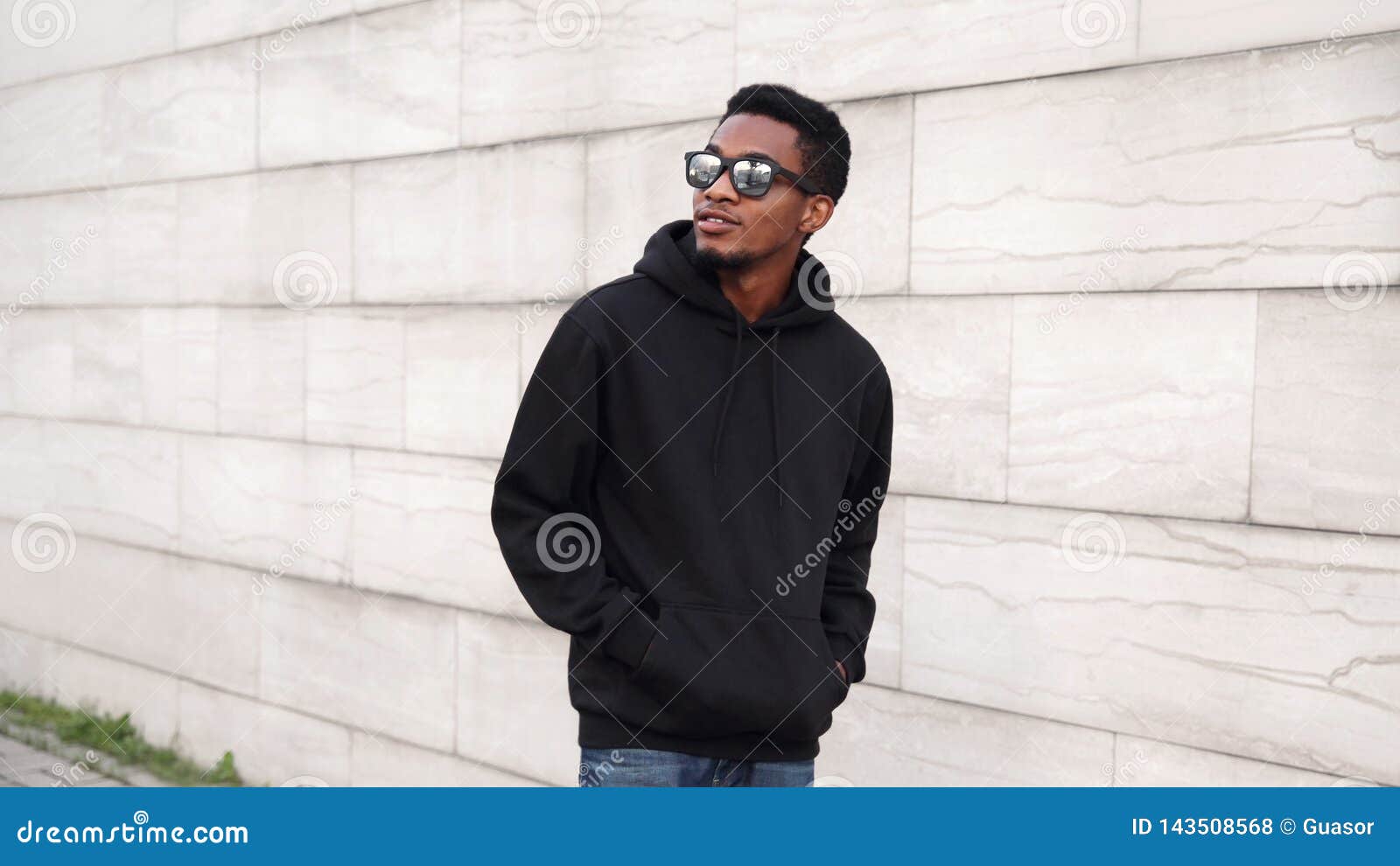 Portrait African Man in Black Hoodie, Sunglasses Walking on City Street ... Portrait African Man in Black Hoodie, Sunglasses Walking on City Street ...