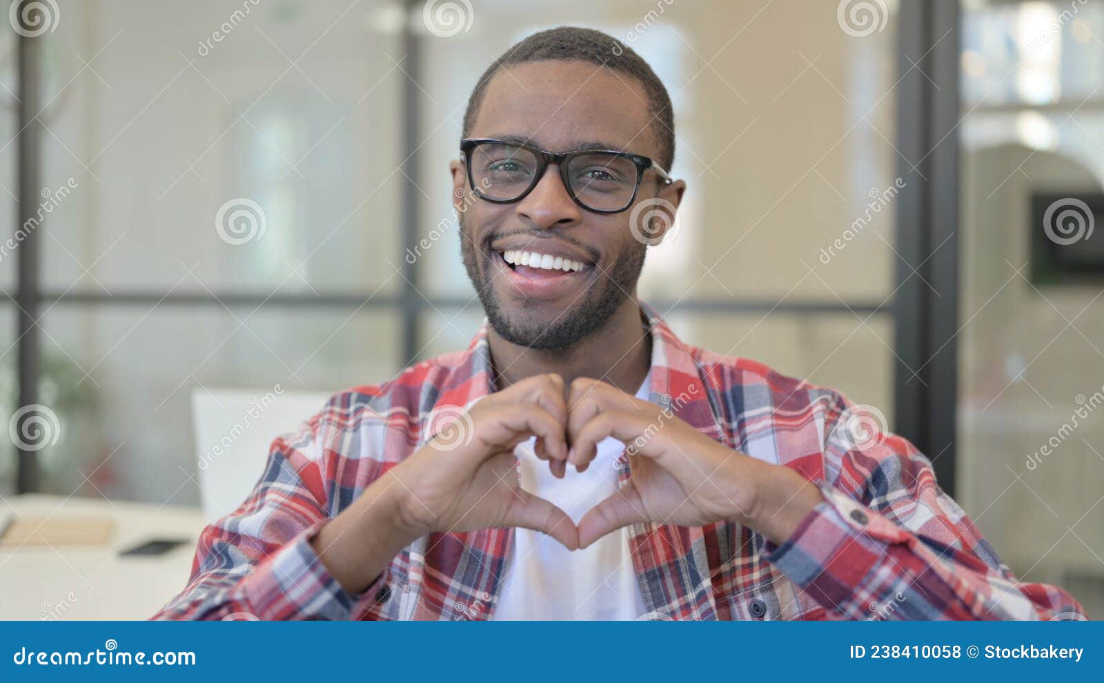 Portrait of African Man Showing Heart Shape by Hands Stock Photo ...