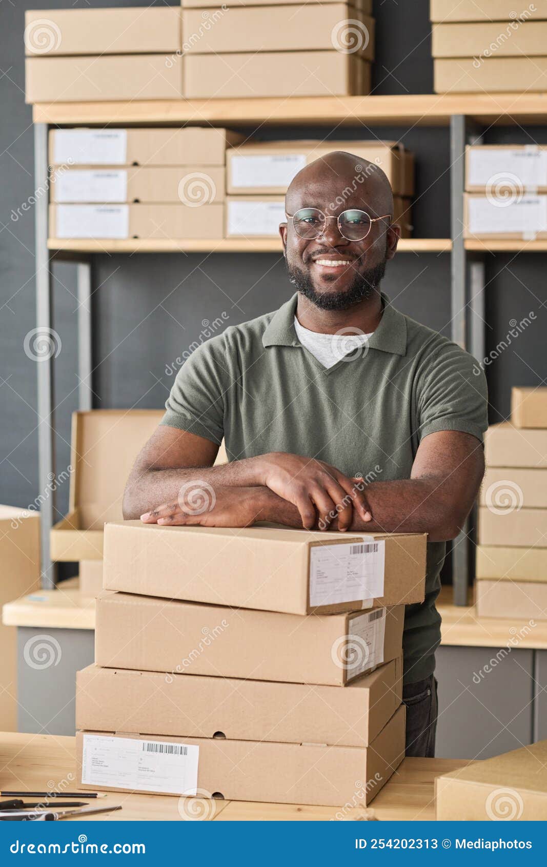 Warehouse Worker Distributing Parcels in Warehouse Stock Image - Image ...