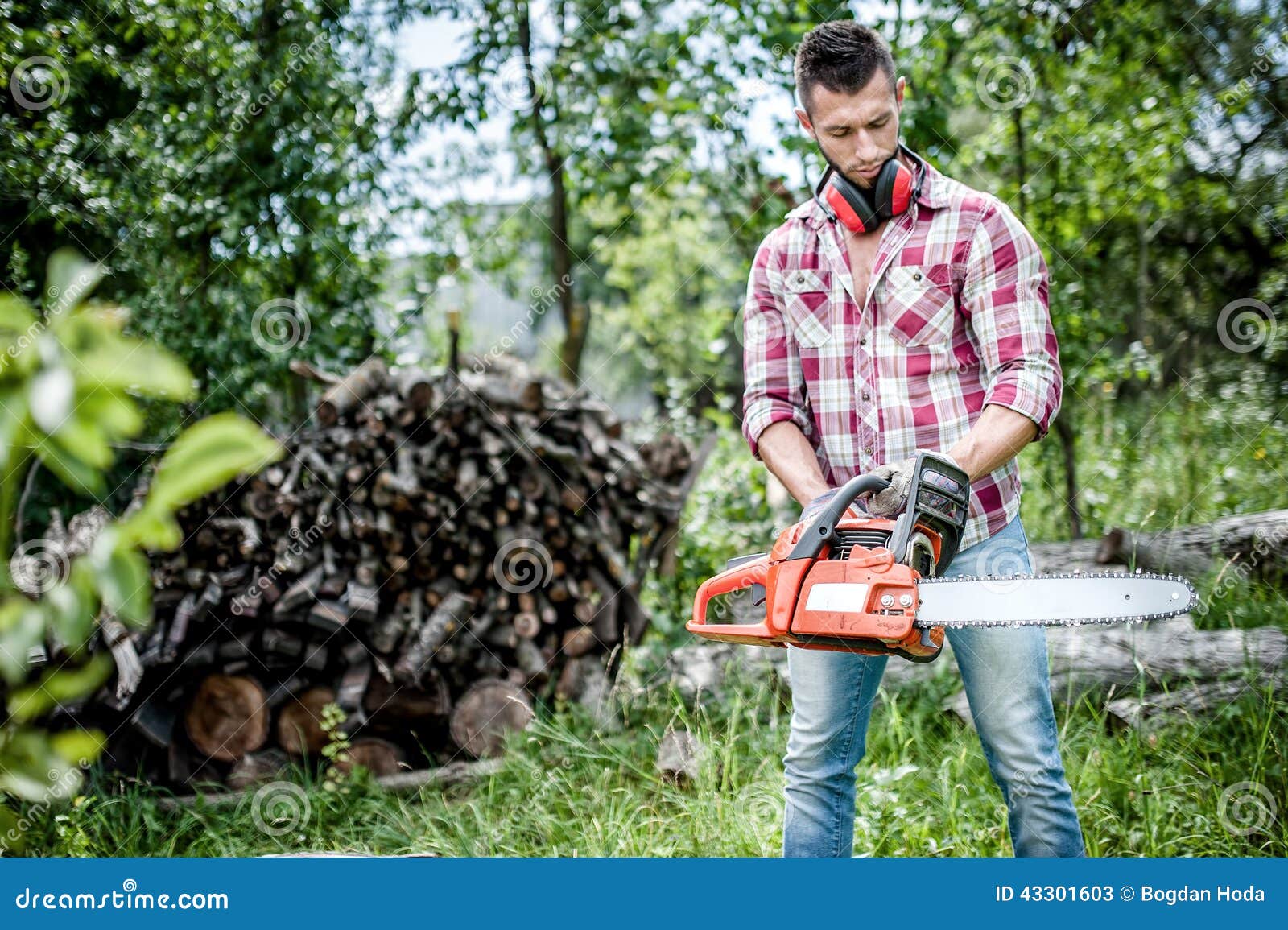 Portrait of Aggressive, Muscular and Athletic Man with Chainsaw Stock ...