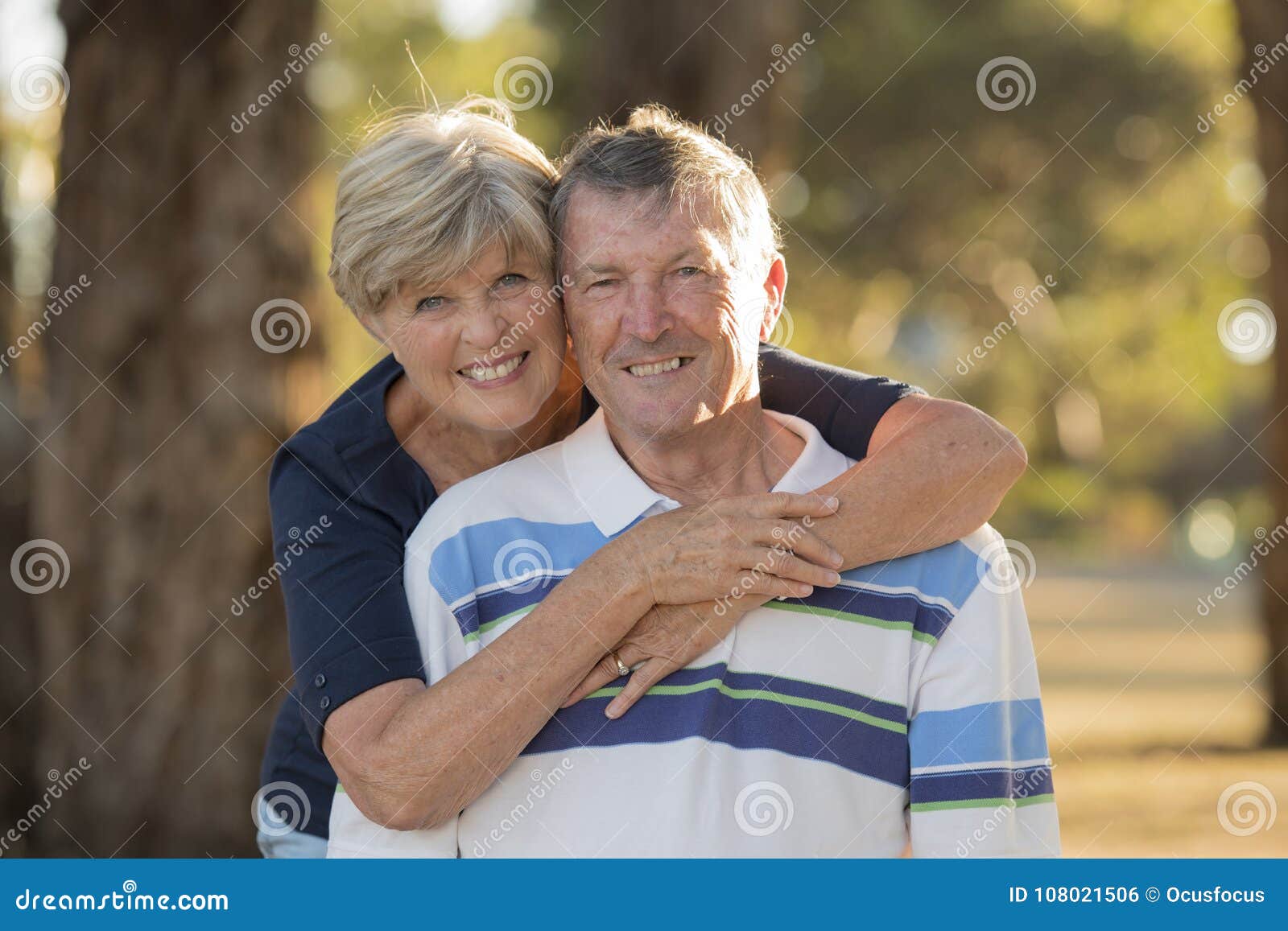 Portrait Of American Senior Beautiful And Happy Mature Couple Around 70
