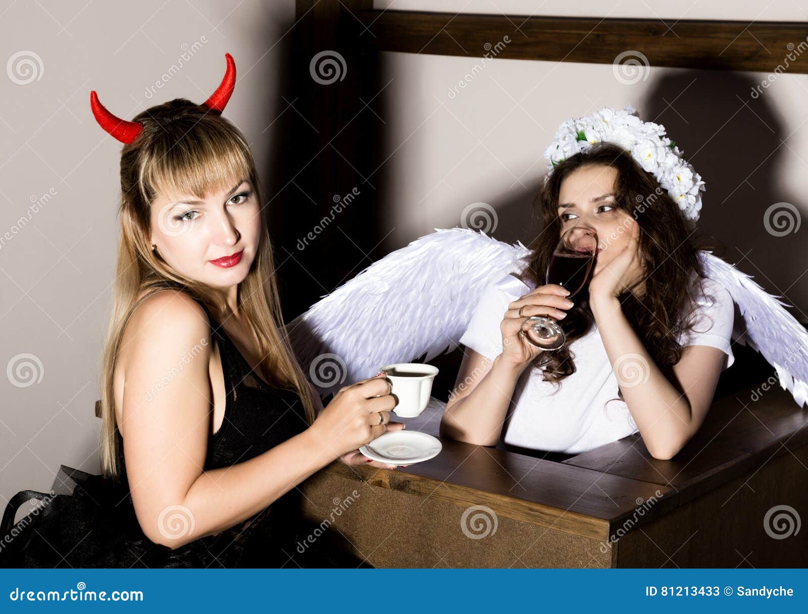 Portrait of Angel and Devil Womans Drink Coffee Nad Wine Stock Image ...