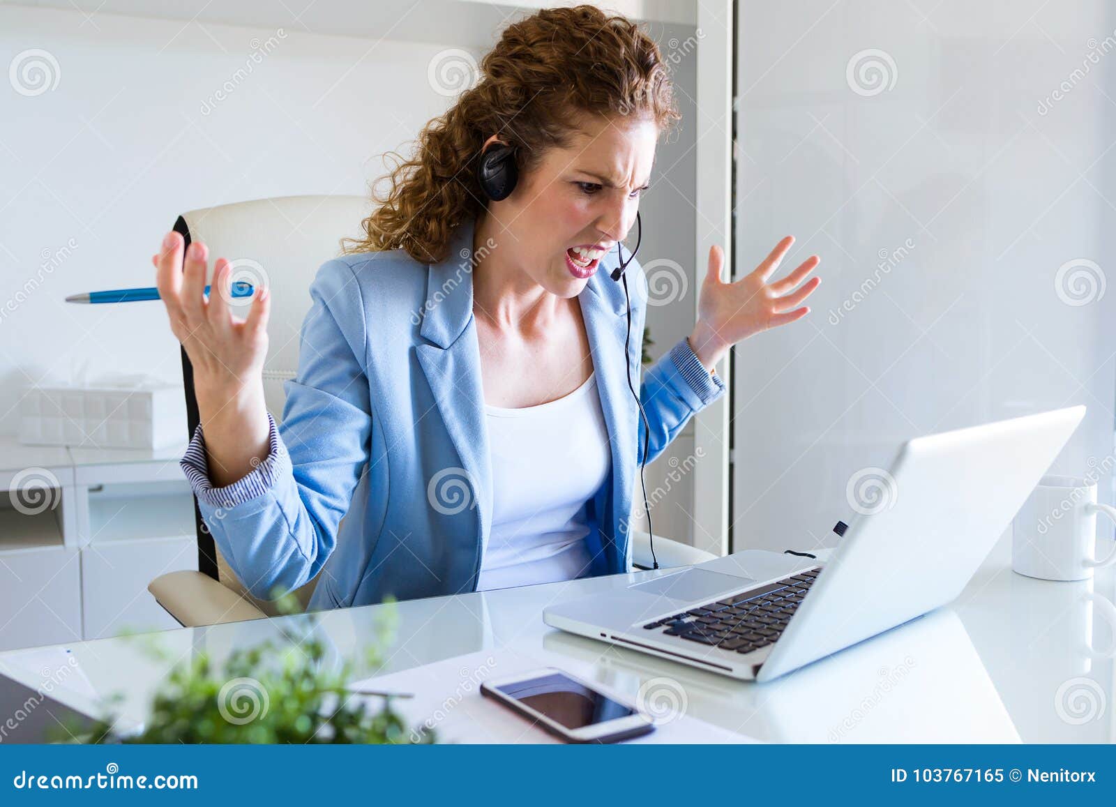 Angry Customer Service Operator Talking on Phone in the Office. Stock ...