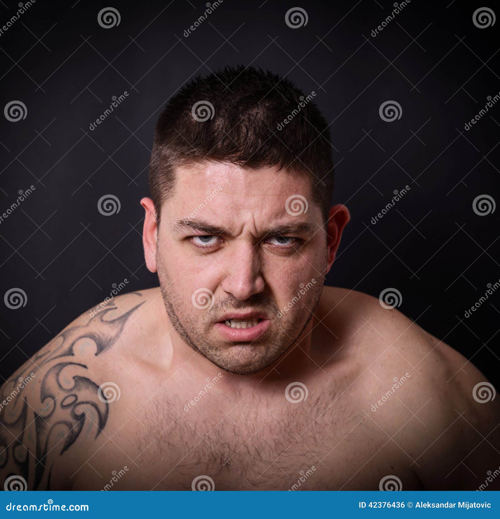 Portrait of Angry Man Against Dark Background Stock Photo - Image of ...
